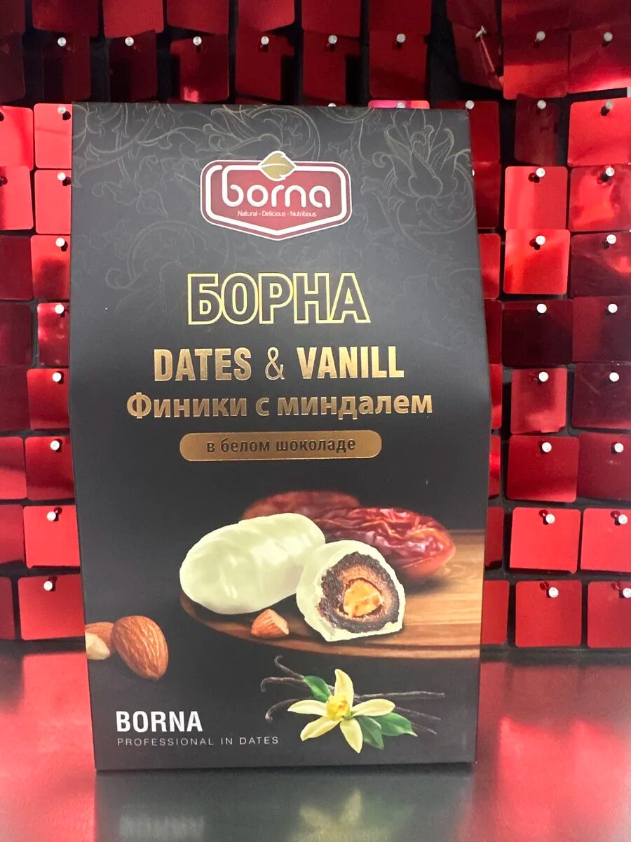 Финики с миндалем в белом шоколаде