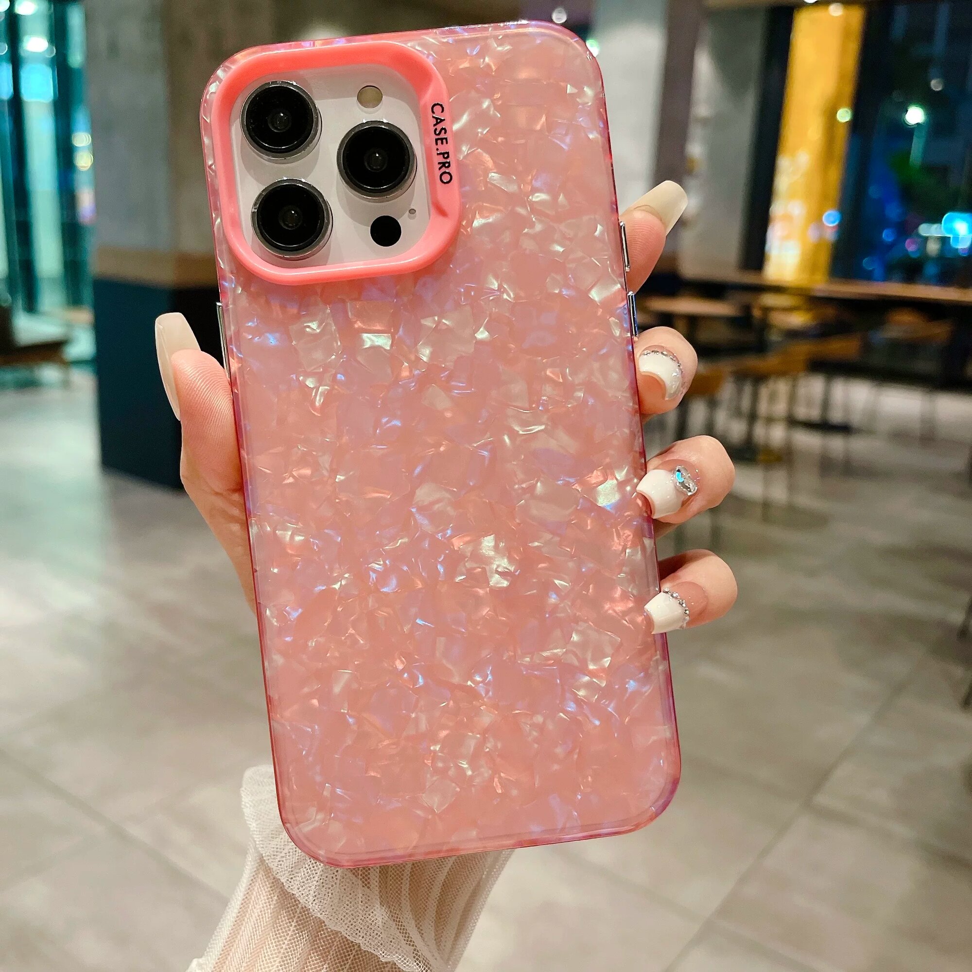 Чехол для iPhone 15 Plus с морской раковиной, цветом Теплый розовый, технологией IMD и большими отверстиями
