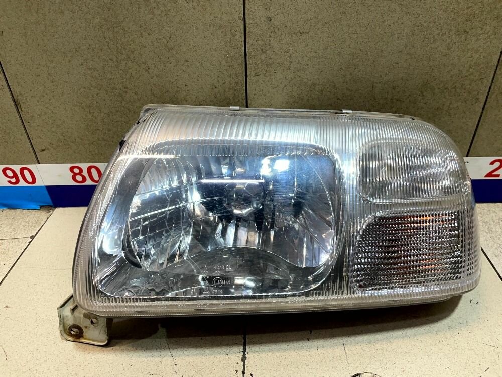 Фара левая Suzuki Grand Vitara