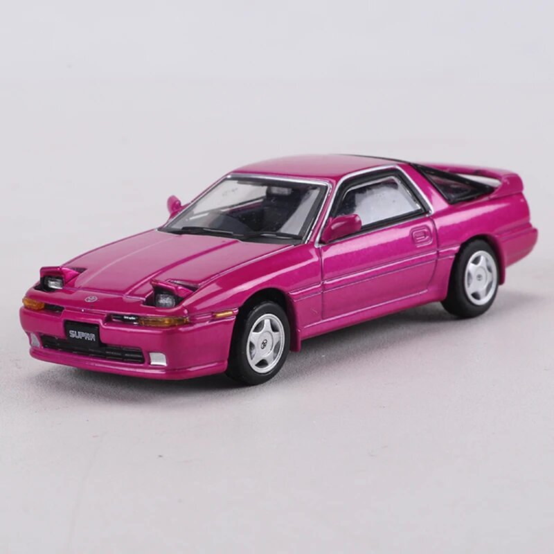 Коллекционная модель Toyota Supra A70 розовый 1:64