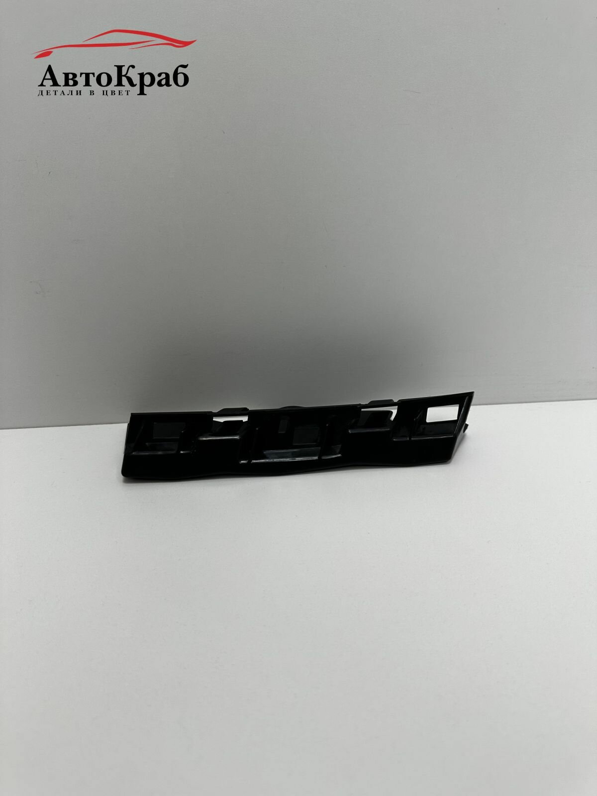 Кронштейн переднего бампера левый Лада Travel 2020-2026