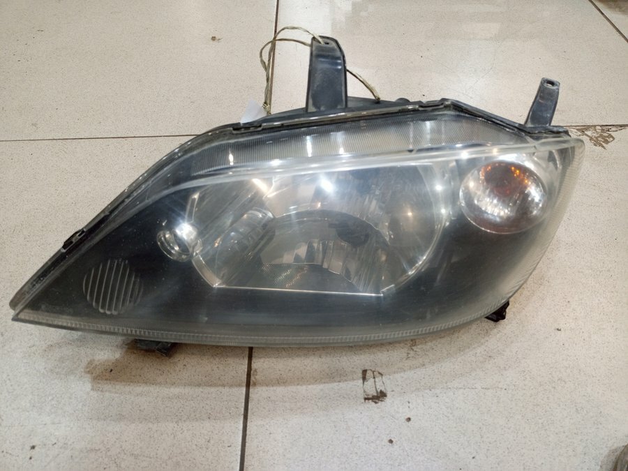 Фара левая от Mazda Demio DY 2003-2007