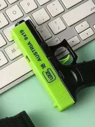 Игрушечный пистолет для снятия стресса
