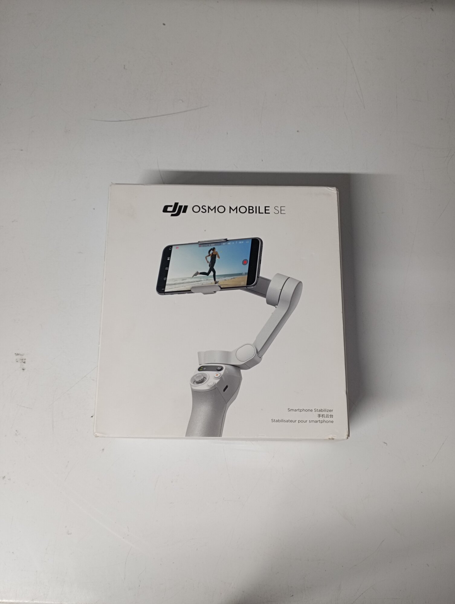 Электрический стабилизатор для смартфона DJI Osmo Mobile SE (OM SE) / серый