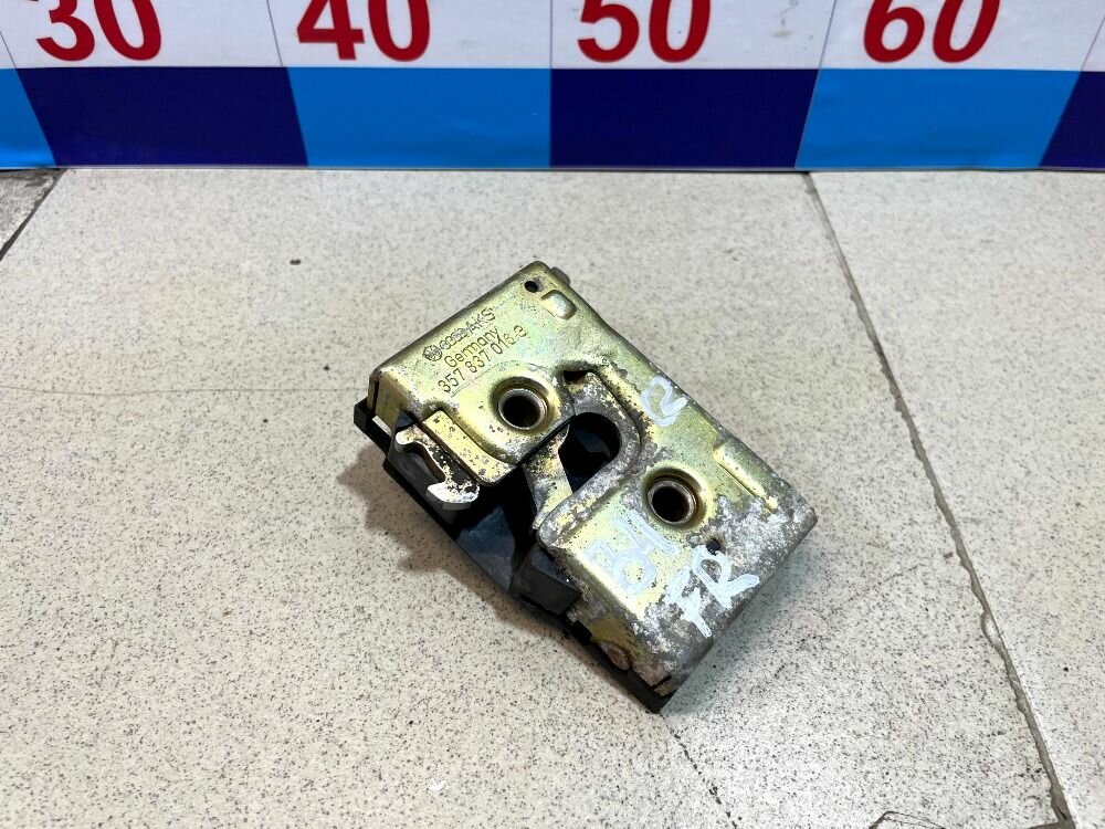 Замок двери передней правой VW Passat B4