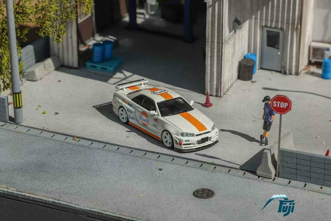 Коллекционная машинка Fuji 1:64 Nissan Skyline R34 GT-R Nismo Z-Tune Gulf White