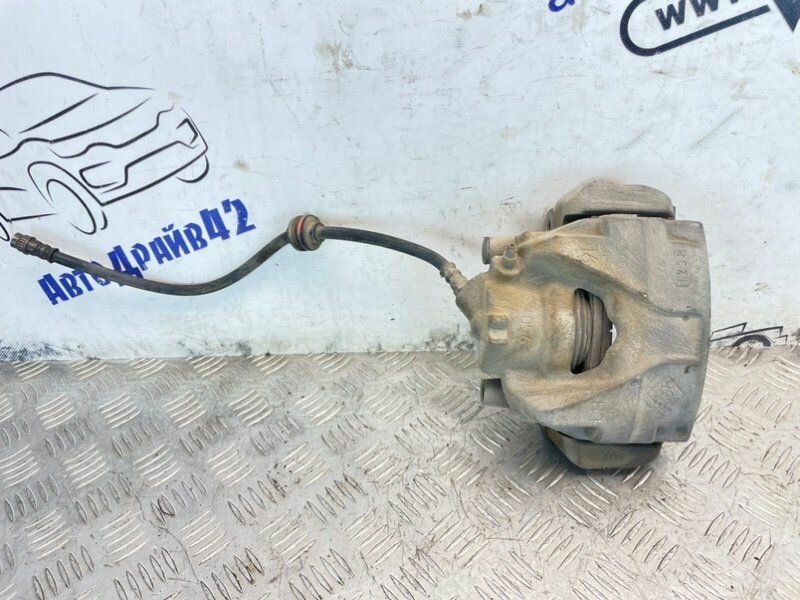 Суппорт тормозной Renault Duster 2012 7701208332 HSM F4RA400, передний левый (с пробегом)