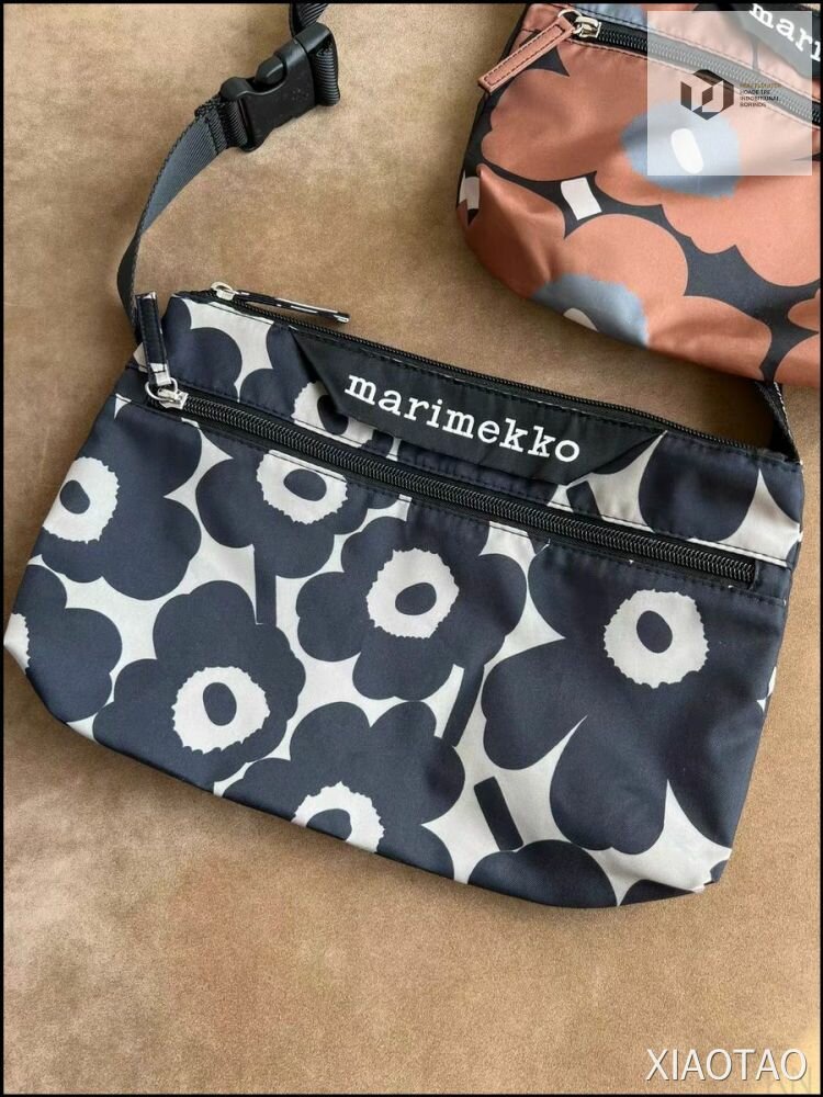 Сумка на плечо Marimekko с цветочным принтом, черная с белыми цветами, регулируемый ремень, для повседневного использования — фото 1