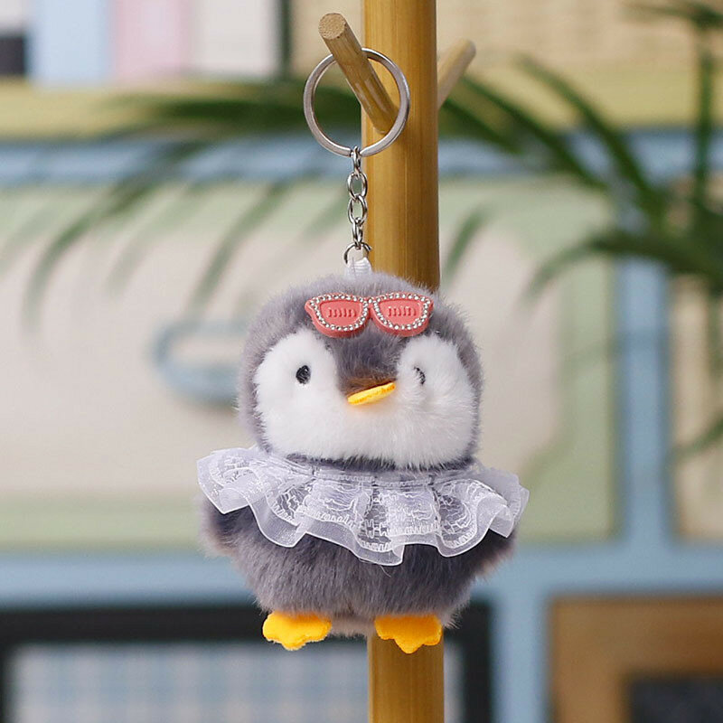 Cartoon penguin stuffed animal with short plush material for gift giving white dresspenguin