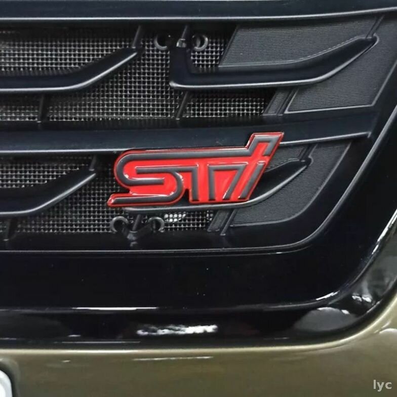 Эксклюзивный аксессуар Subaru: металлический значок STI 92x35 мм для решетки радиатора