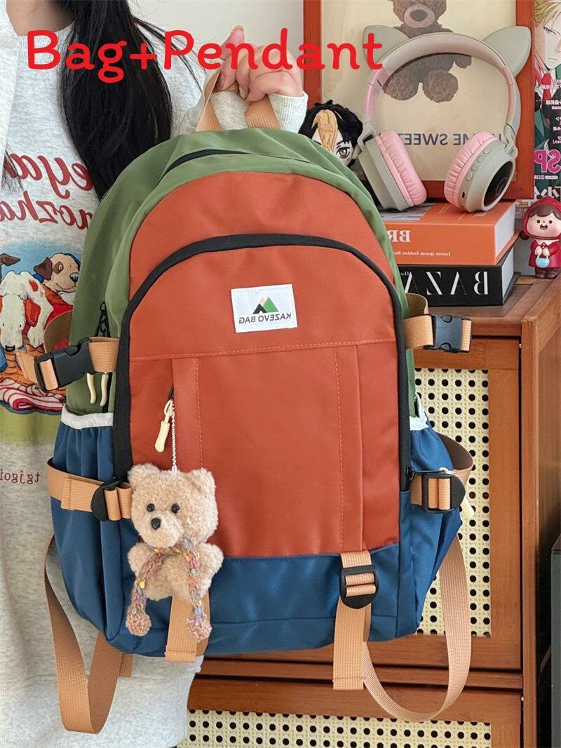 Student backpack with color block pattern and 14in laptop compartment for middle school and high school orange