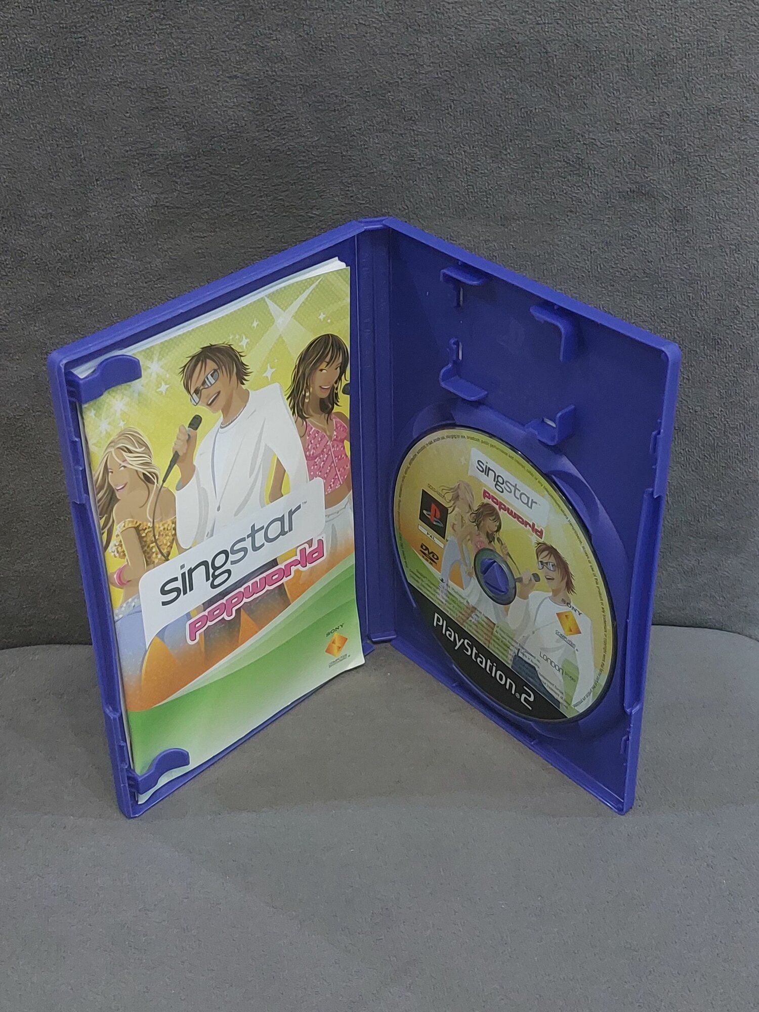 Видеоигра SingStar Popworld PS2 — фото 1