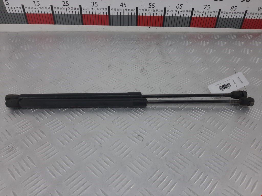 Амортизатор крышки багажника / 1577776 90450AX610 90450AX610 для Nissan Micra K12 (с пробегом)
