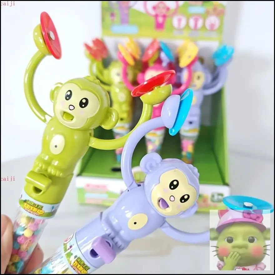 Забавная игрушка обезьянка с тарелками и конфеты