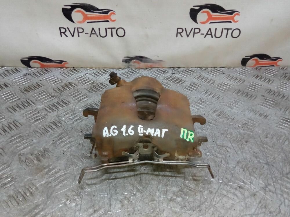 Суппорт передний правый Opel Astra G 1998-2005