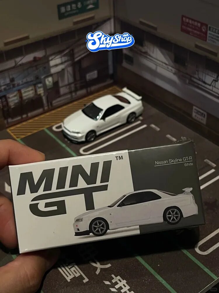 Машинка металлическая модель MINI GT 1:64 #397 Nissan Skyline GT-R (R34) V-Spec N1 White