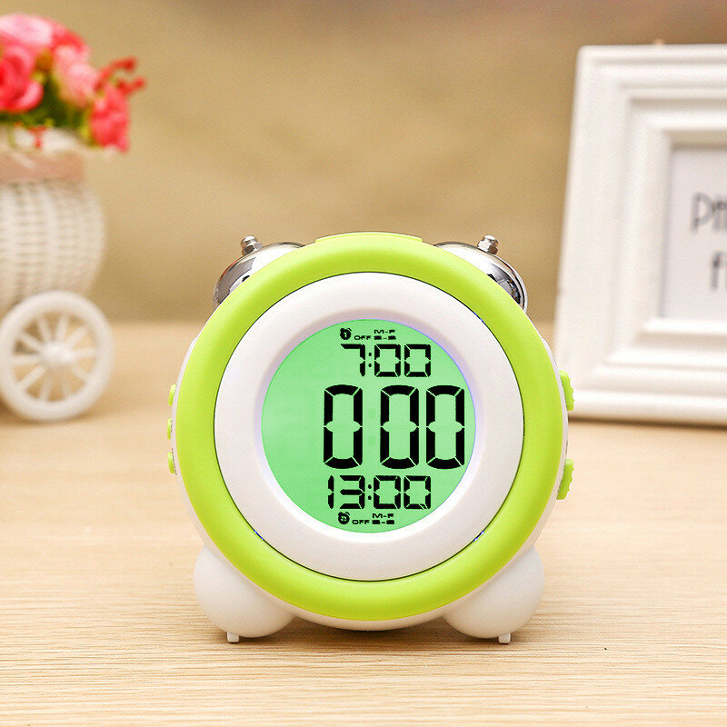 Simple electronic lcd alarm clock with calendar and lighting features for office or bedroom light green