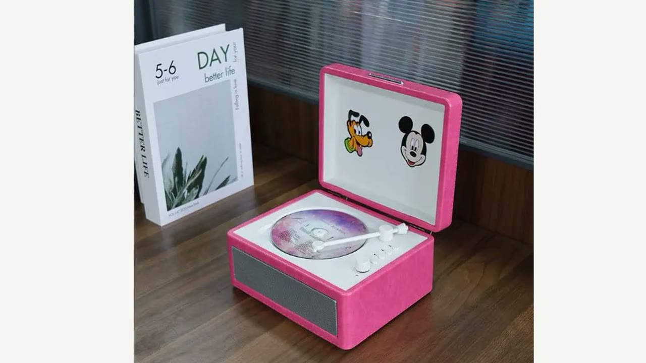 Портативный CD-проигрыватель розового цвета с поддержкой MP3, USB, разъемом 3.5 мм — фото 1