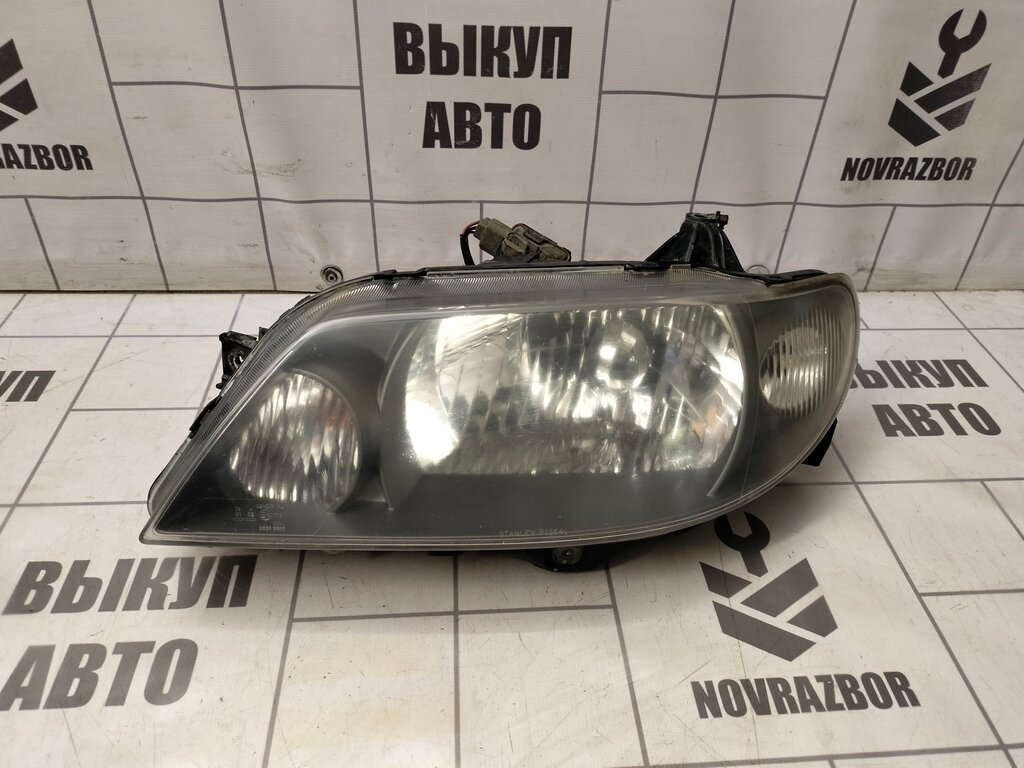 Фара левая Mazda 323 BJ Protege Familia 1998-2002
