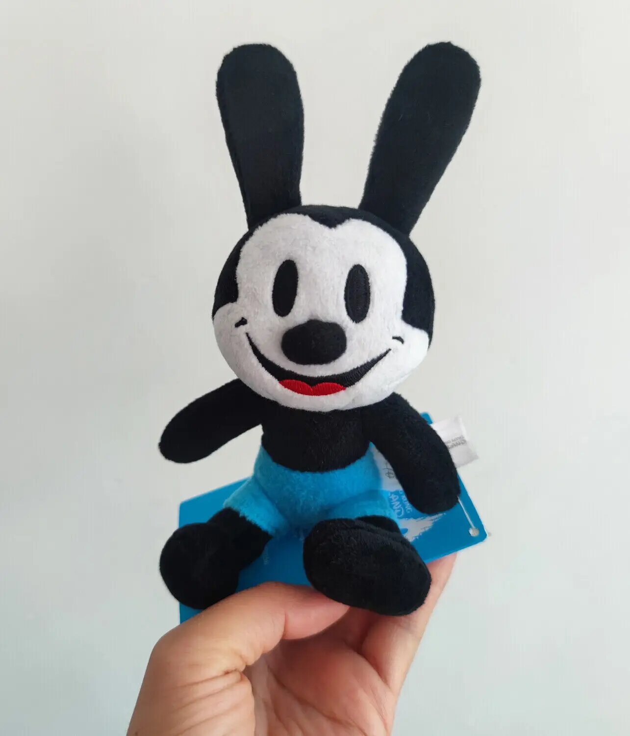 Disneyland плюшевый Oswald счастливый кролик