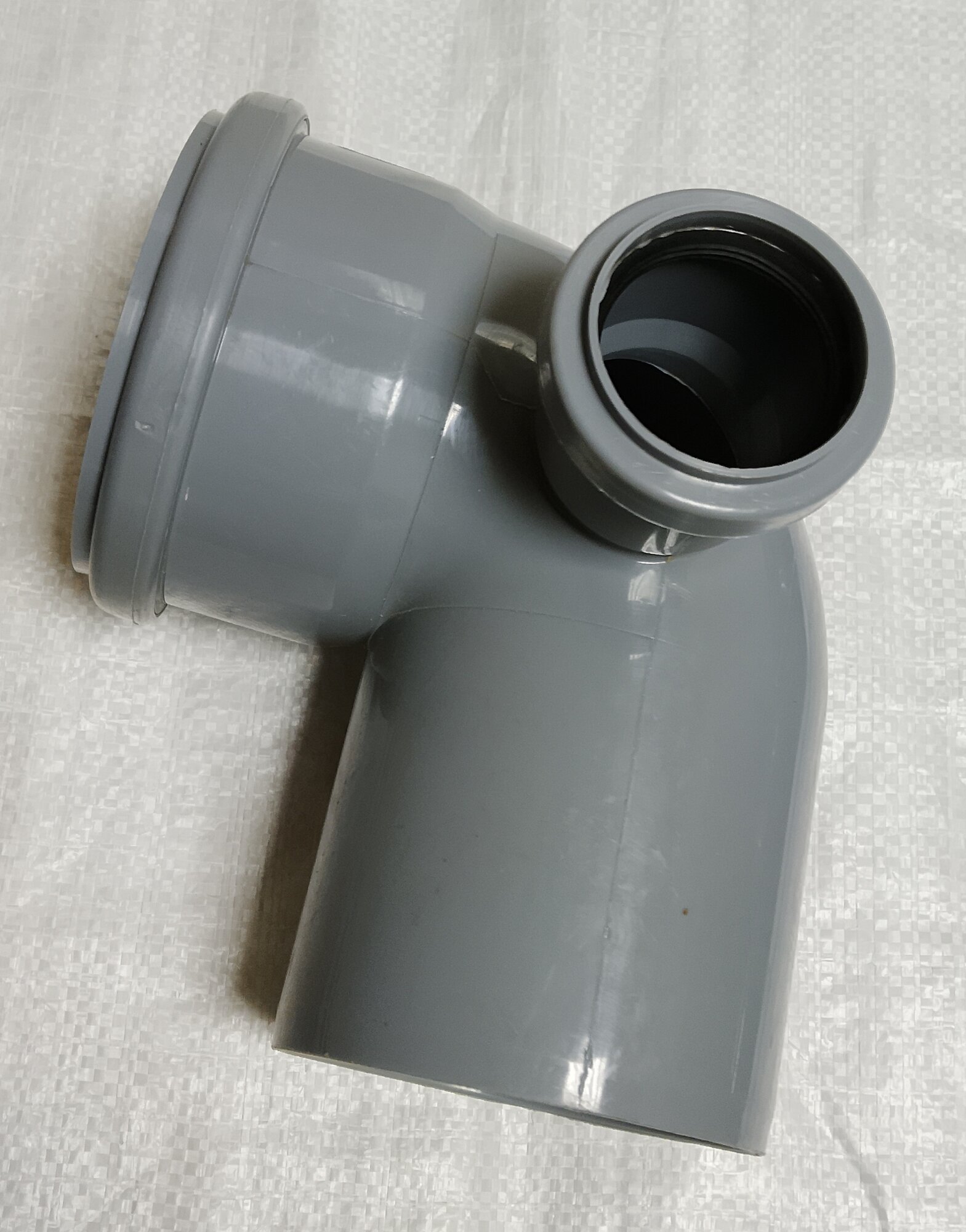 Отвод ПП 110 х 87,5 ° "Политэк" с правым выходом на 50.