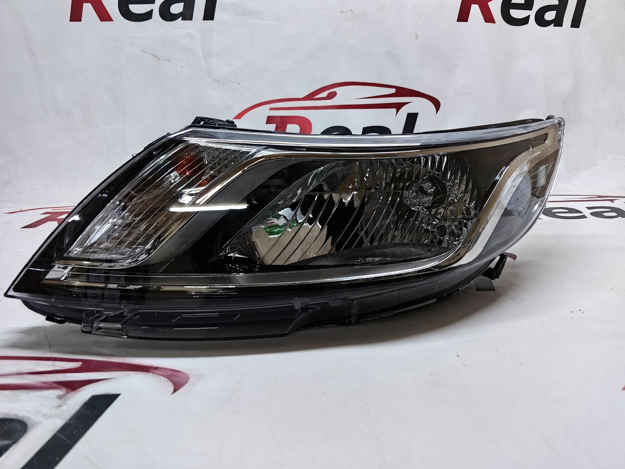 Фара левая для Kia Rio/Киа Рио 2010-2014г.