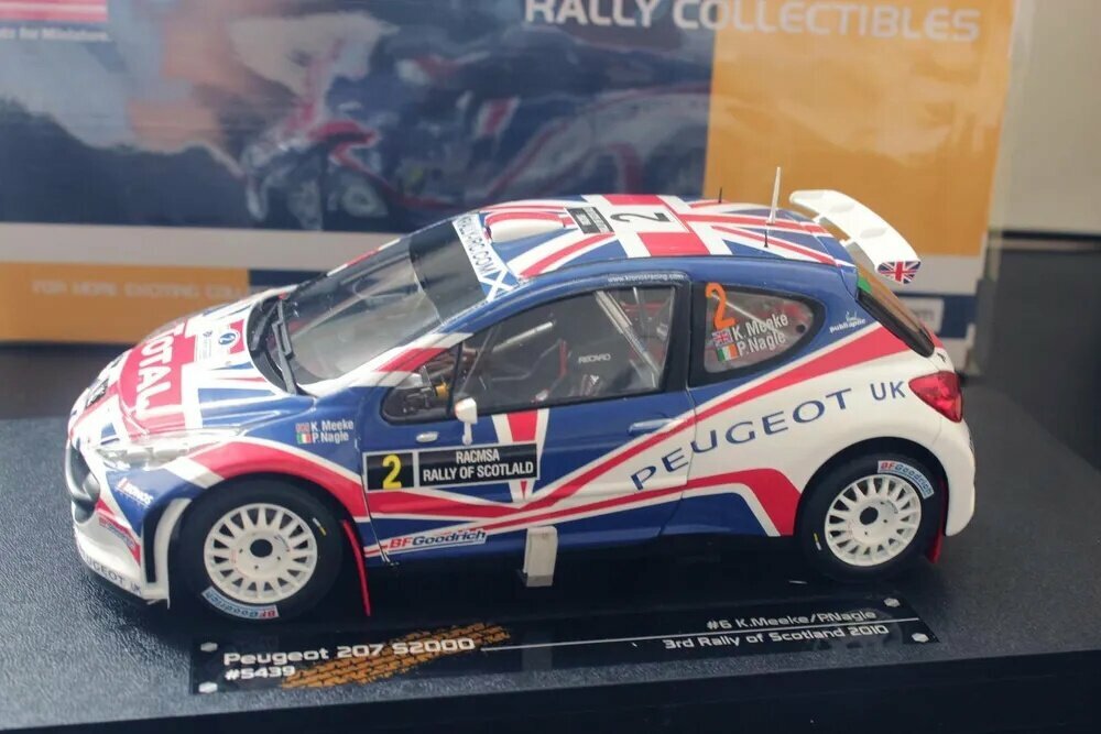 1:18 Sunstar Peugeot 207 S2000 WRC 2010 года№ 2 Ралли-кар, литая модель с британским флагом