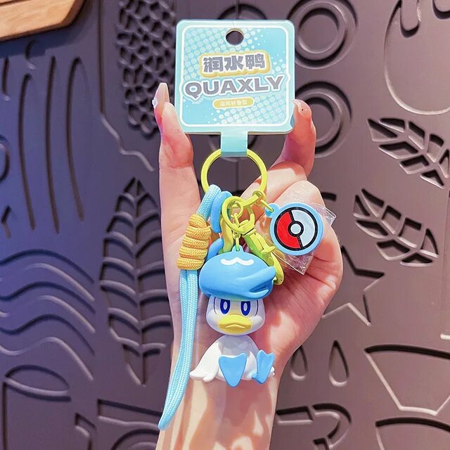 Оригинальные брелоки Pokémon с изображениями Пикачу, Генгара, Сильвеона, Спригатито, Кваксли Фуэкоко, аниме-фигурки, игрушки, брелоки, подвески для духов и подарки.