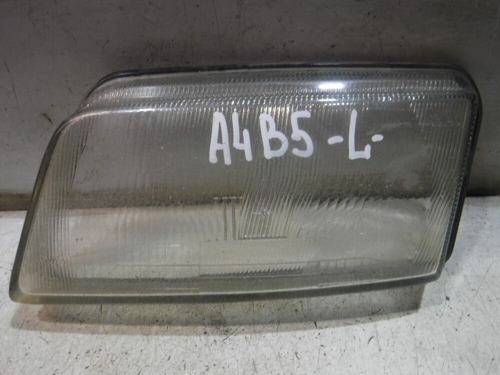 Стекло фары левой Audi A4 B5