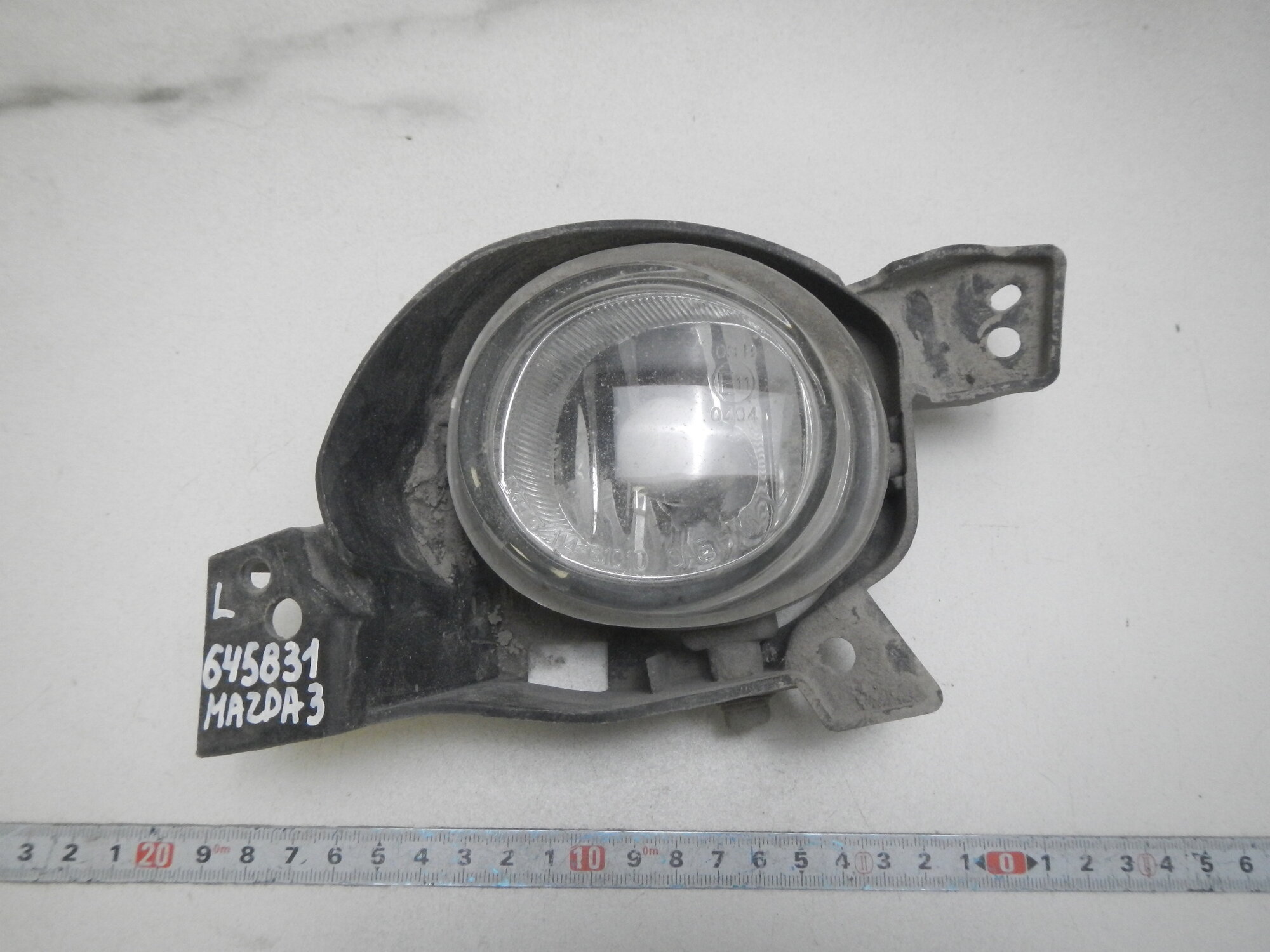 Б/У Фара противотуманная левая, Mazda (Мазда)-3 (BL) (09-13) MAZDA 3 (BL) (09-13) Царапины. 645831 MAZDA арт. BGV851690