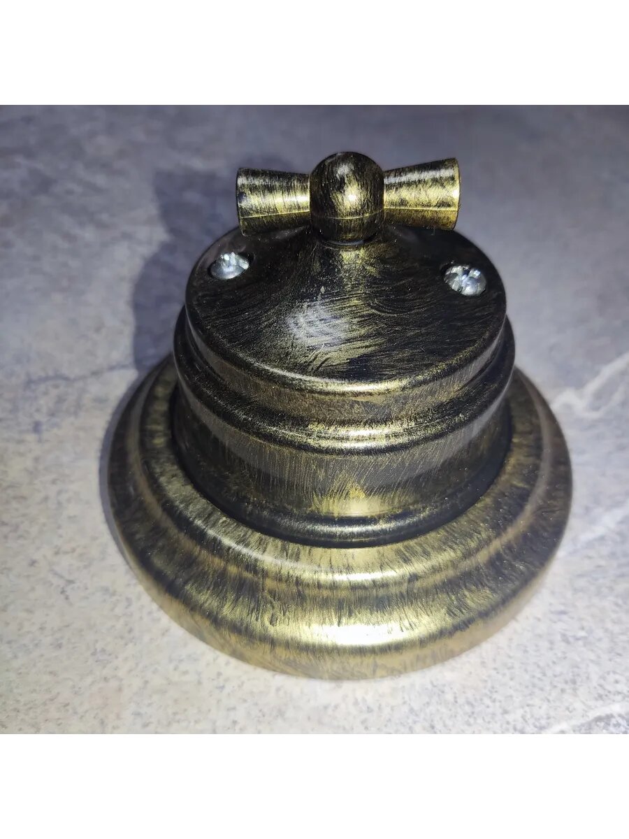 Выключатель 2-клавишный поворотный с рамкой, цвет бронза