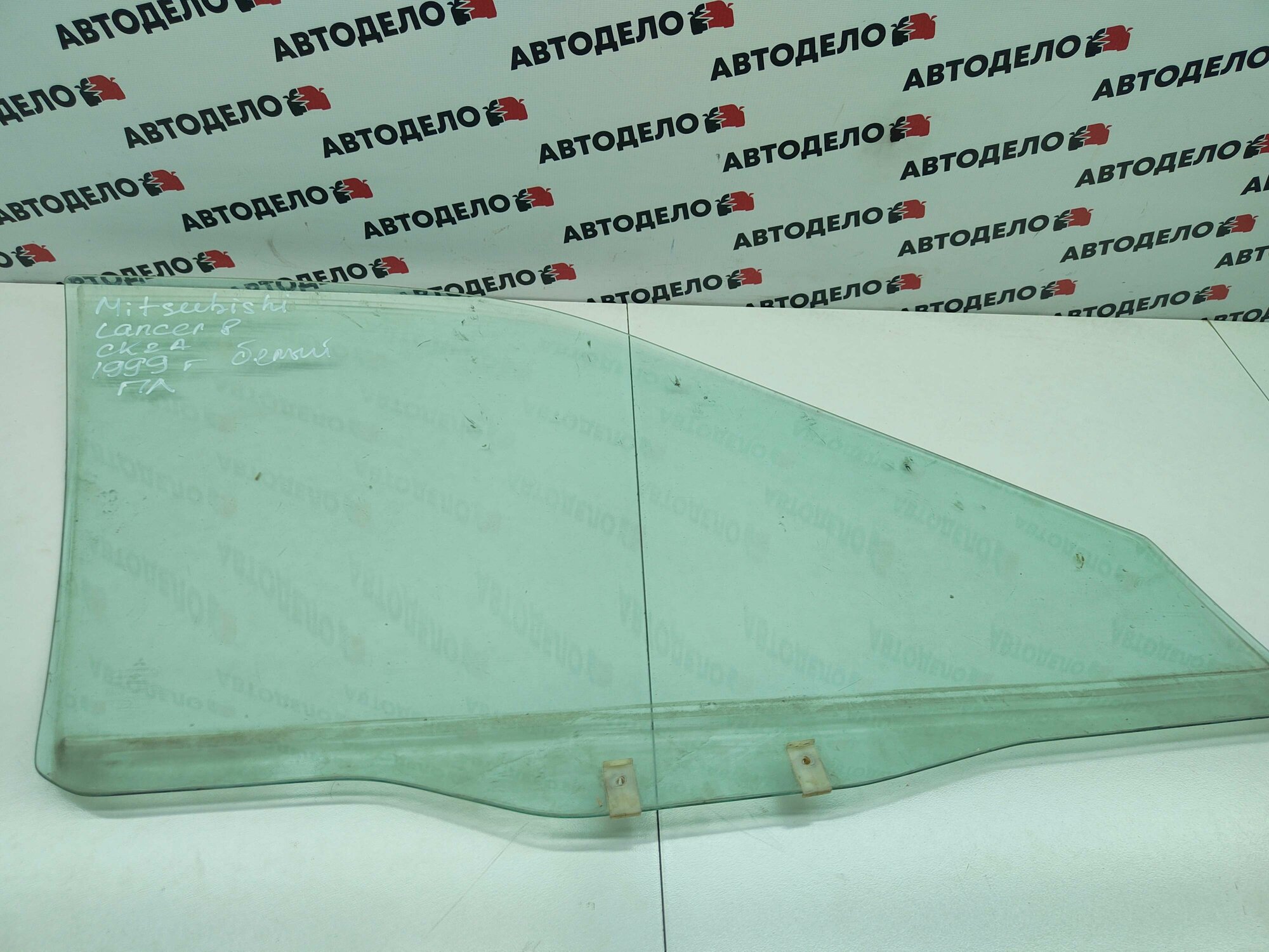 Стекло двери переднее левое Mitsubishi Lancer 8