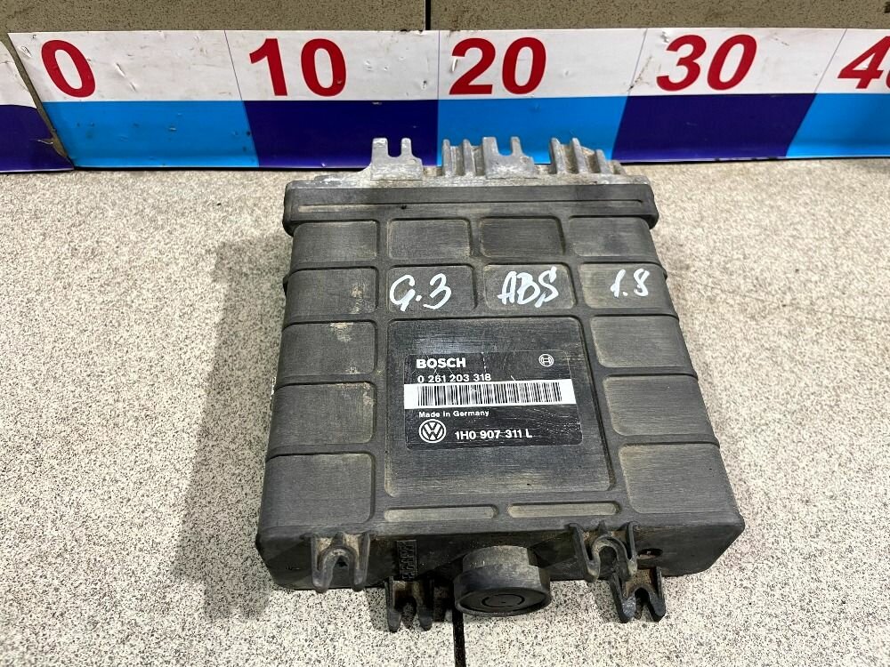 Блок управления двигателем VW Golf III 1H0907311L