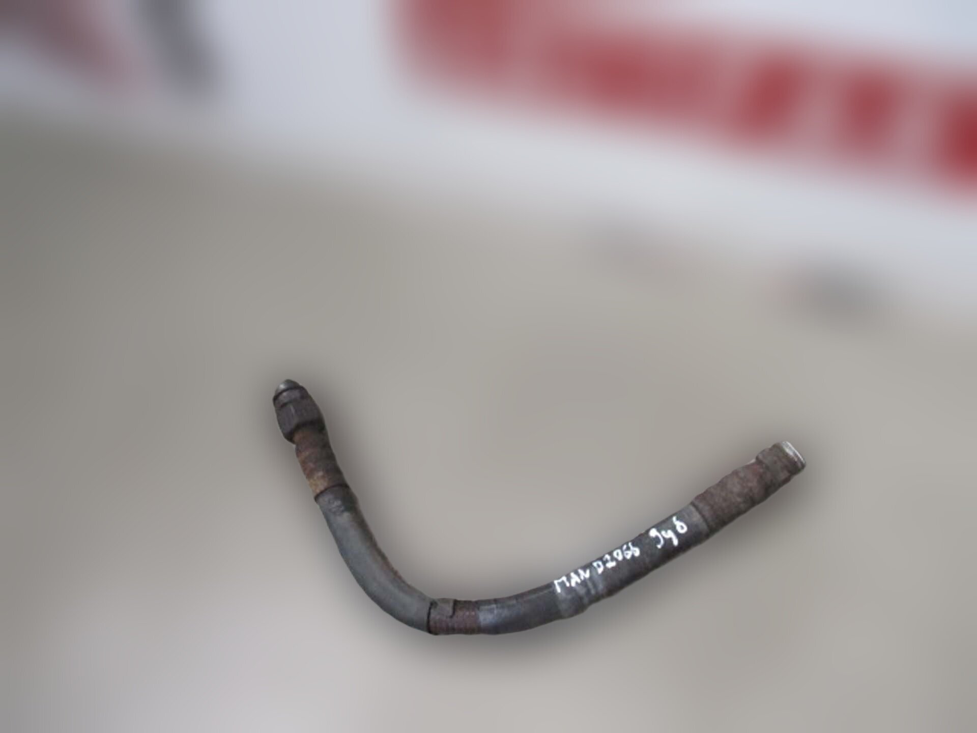 Шланг насоса ГУРа MAN TGA, TGX, TGS, есть повреждения оплетки