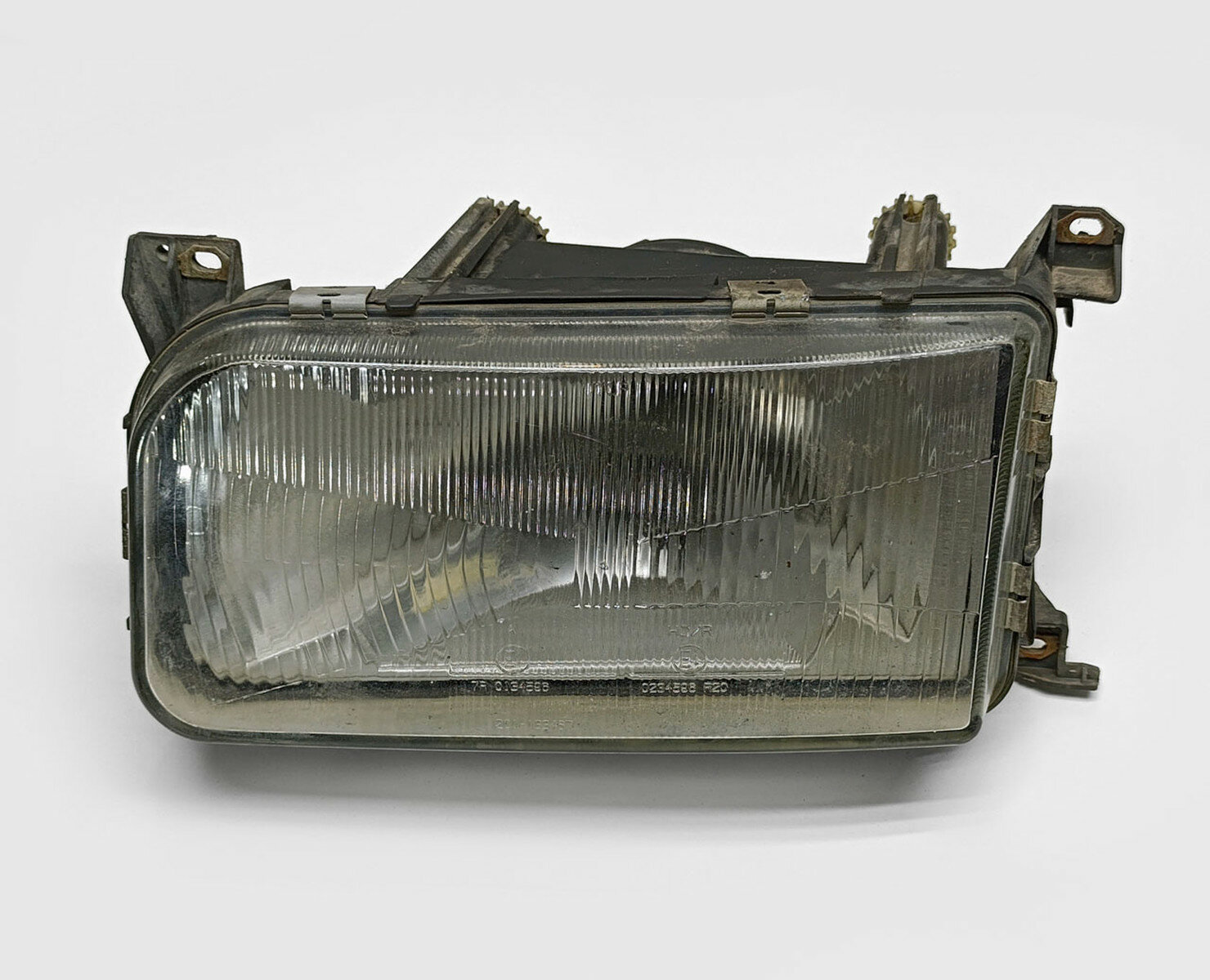 Фара левая VW Passat B3 (Hella)