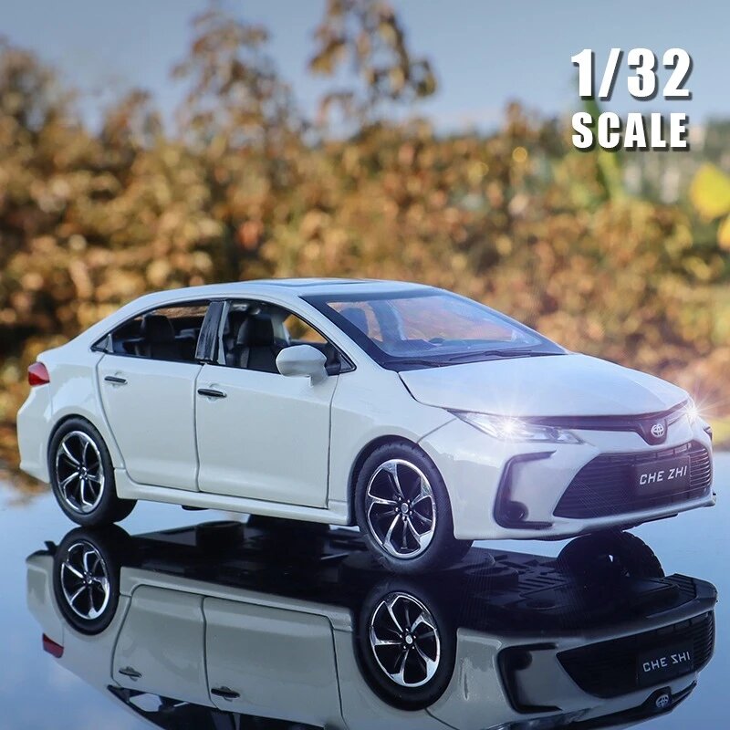 Модель автомобиля MINI AUTO Corolla 1:32 white with box — фото 1
