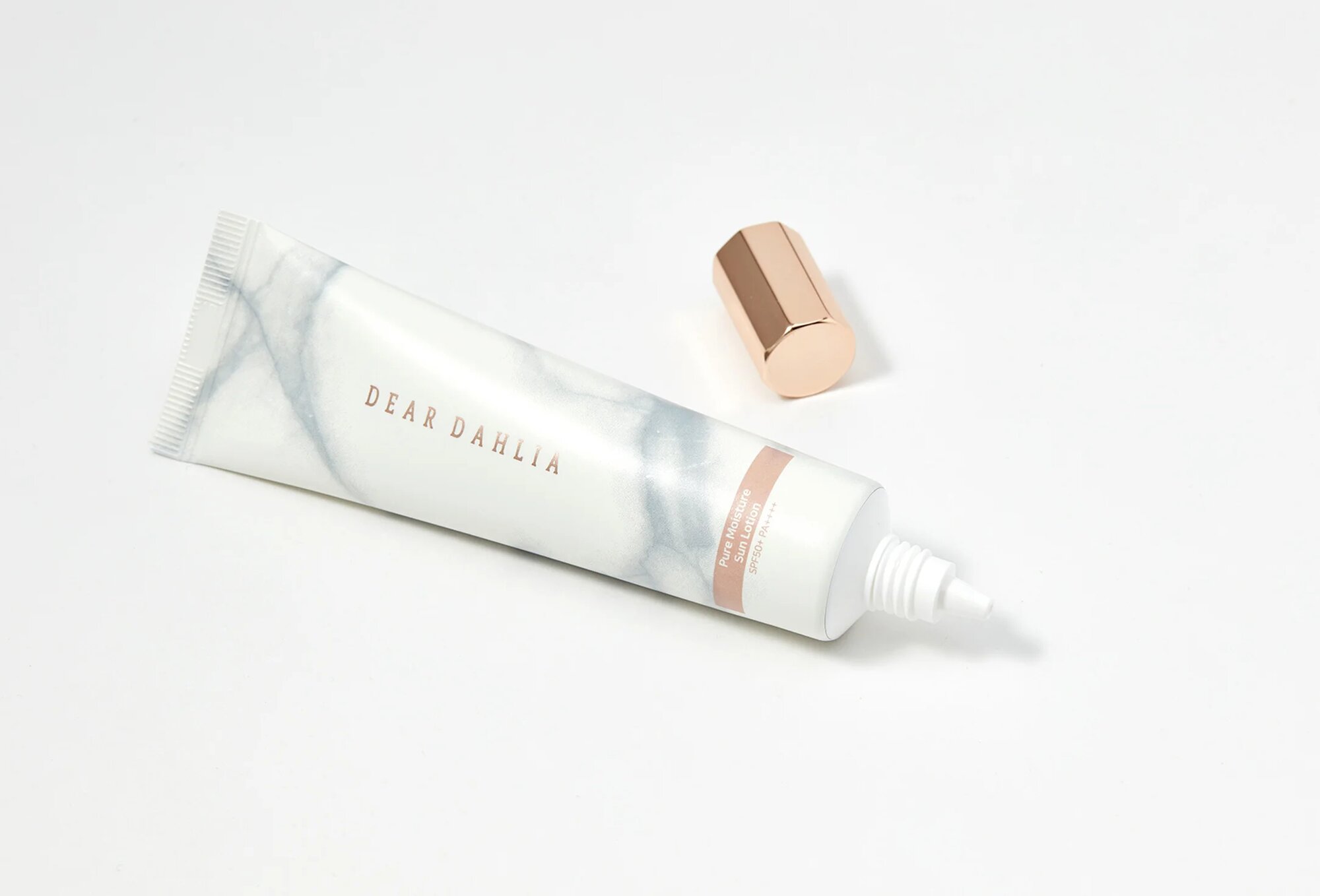 Солнцезащитный лосьон для лица SPF 50 + PA ++++ DEAR DAHLIA SKIN PARADISE PURE MOISTURE SUN LOTION 35 мл