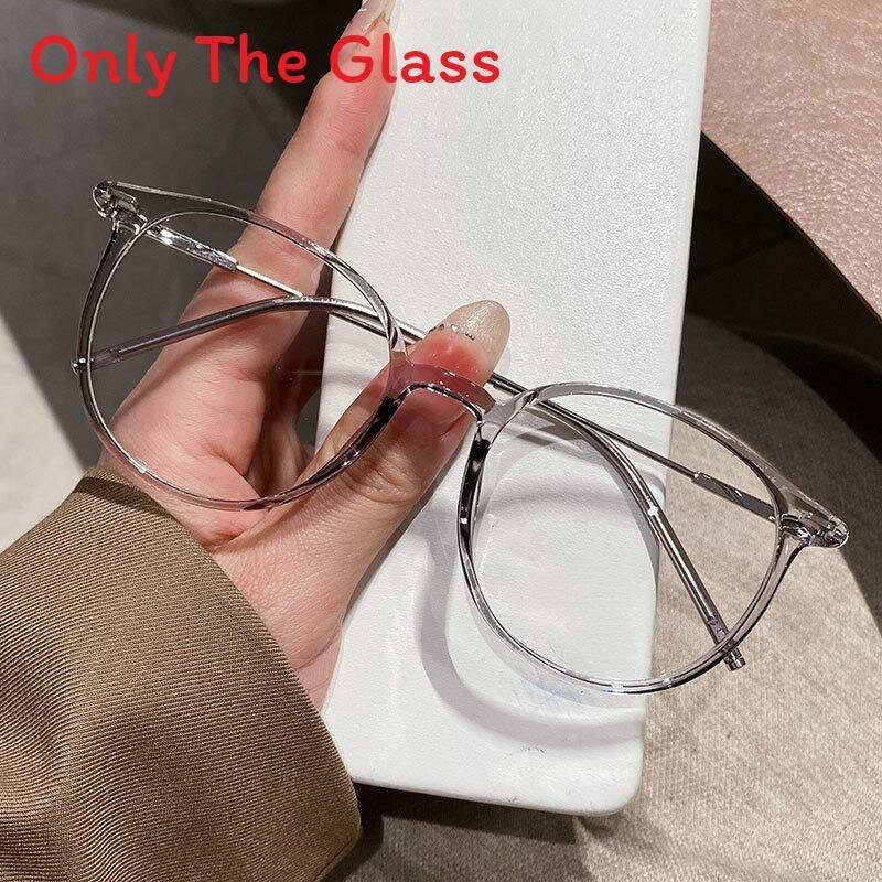 Lightweight round blue light glasses with pc frame and modern style for women, transparent gray