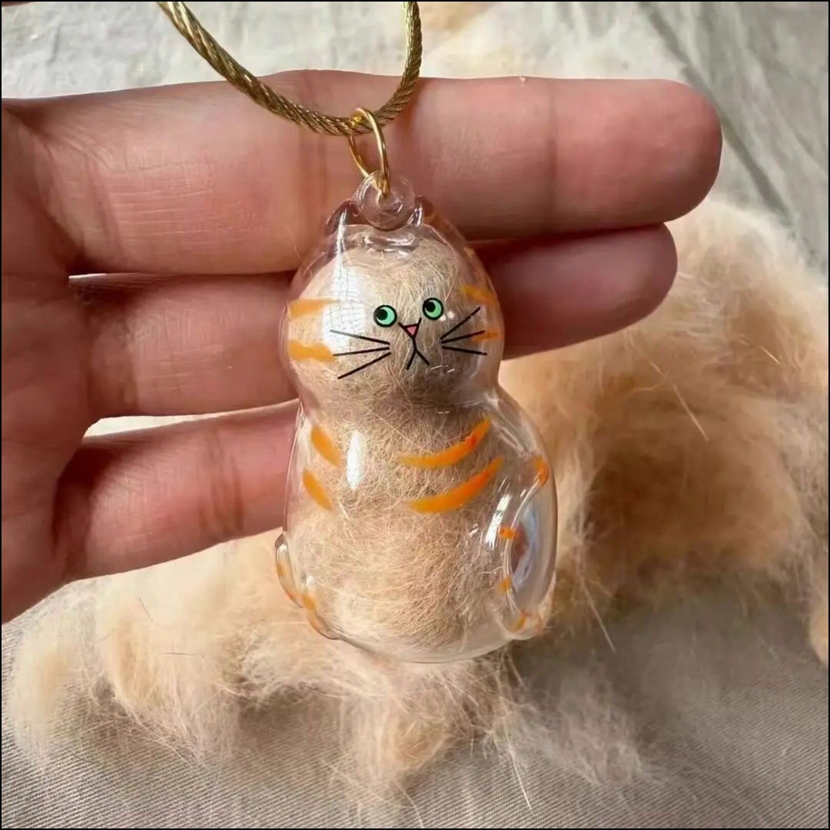 Брелок для хранения кошачьей шерсти