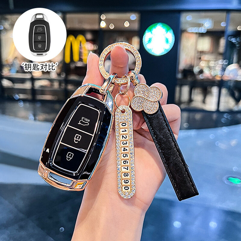 Ключевой брелок Hyundai деловой черный с четырехлистным клевером и номерным знаком для моделей Ix35/Ix25/Elantra/Sonata