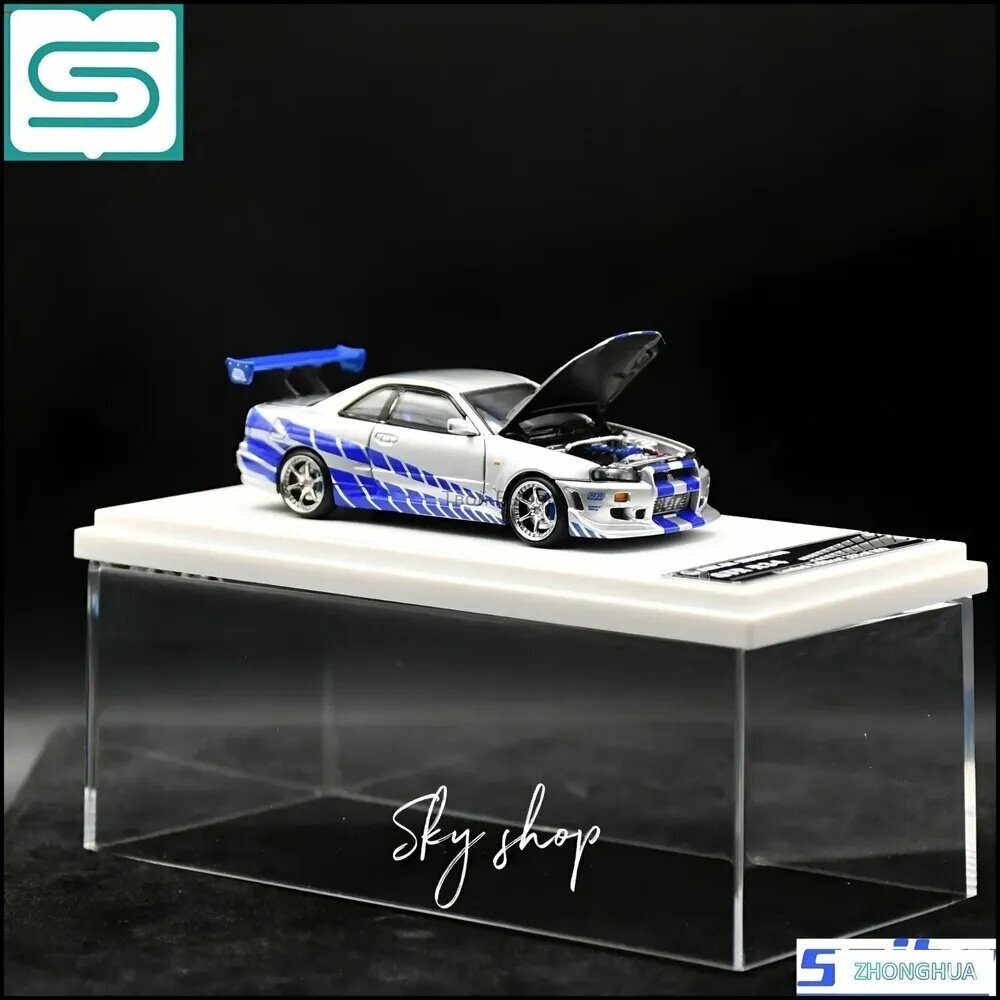 Эксклюзивная модель Nissan Skyline GTR R34 Пола Уокера в масштабе 1:64 от Focal Horizon