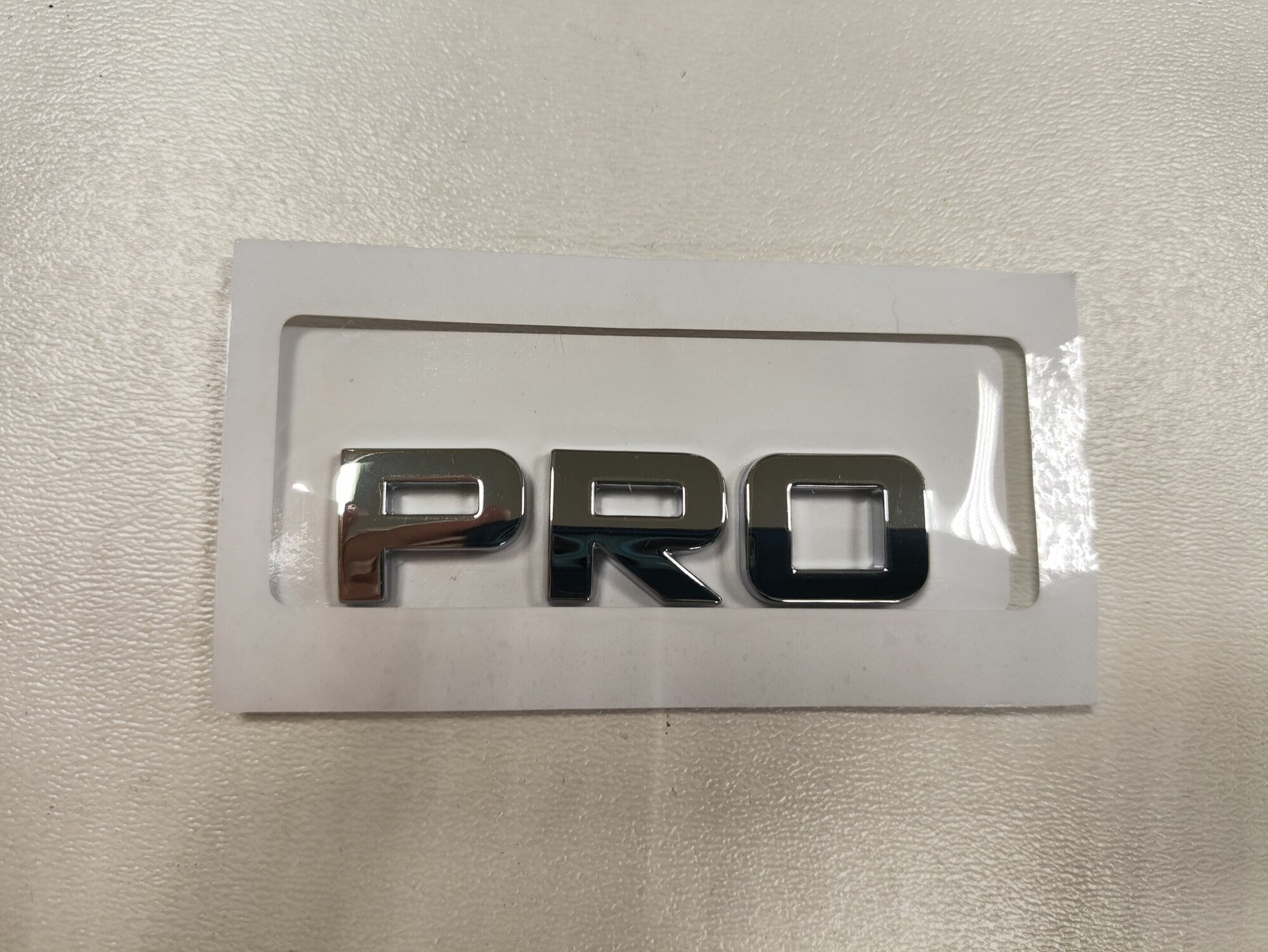Эмблема "PRO" Geely Atlas Pro [1.5 12V 7AMT внедорожник 4X4] 9015059300