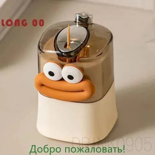 Нажимная коробка для зубочистоk. Содержит упаковку зубочисток