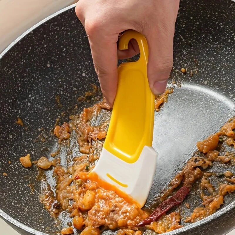 Пластиковый скребок для посуды