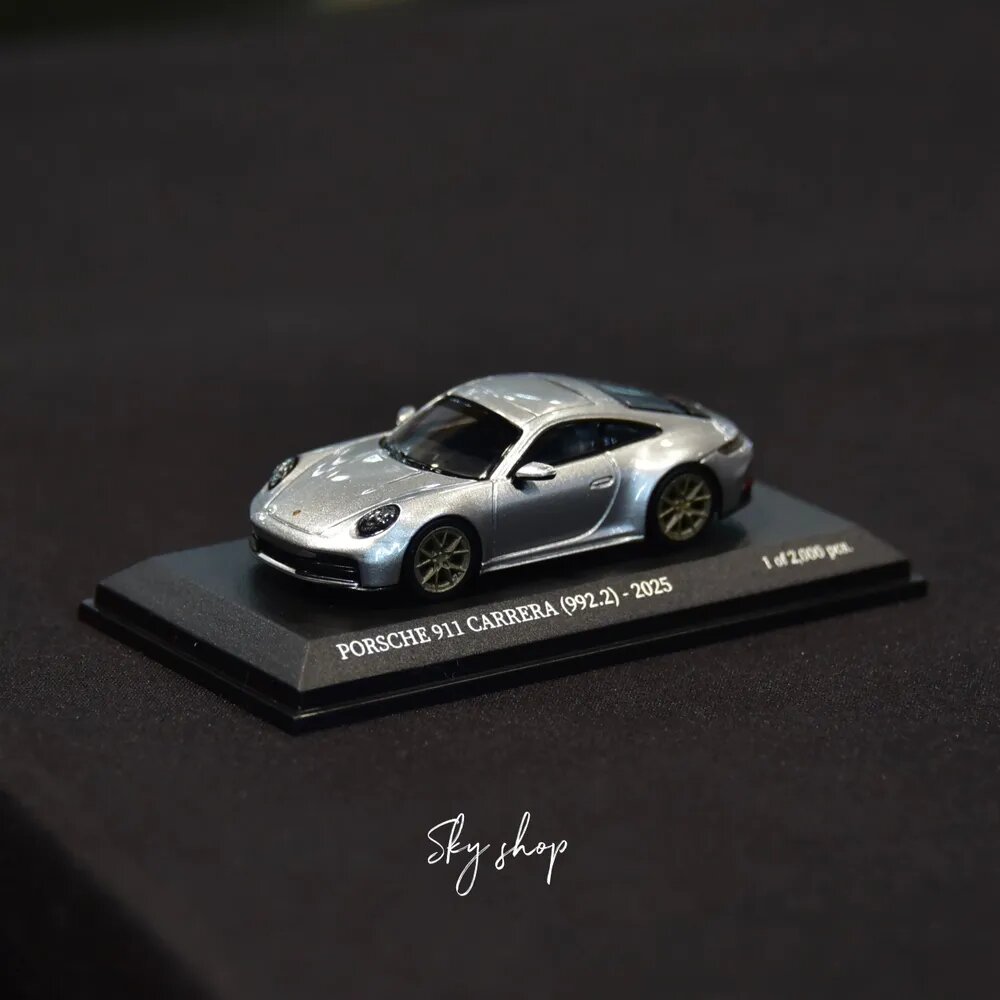 Машинка Minichamps 1:64 Porsche 911 (992.2) Carrera 2025 Silver