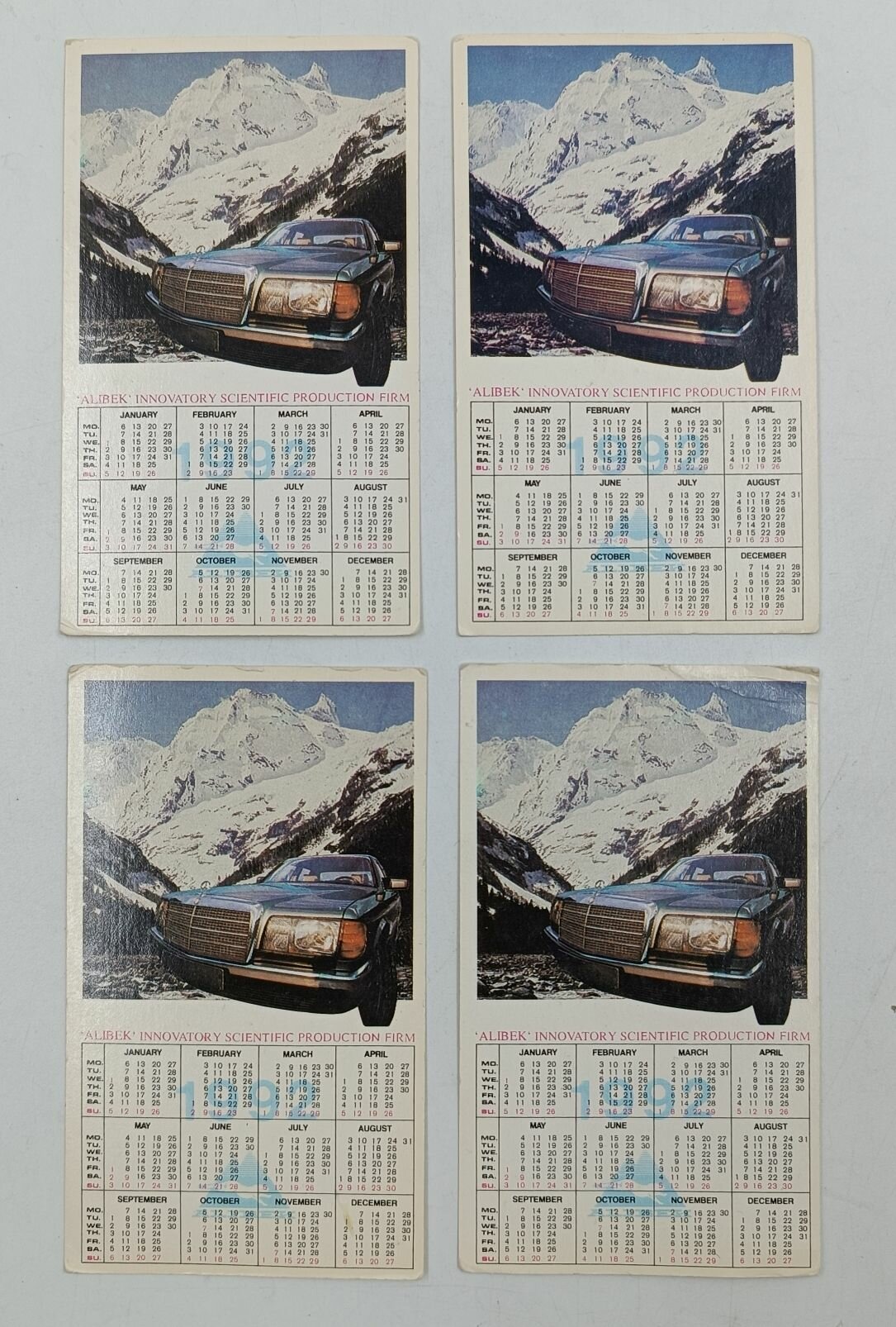 Четыре одинаовых календарика. Реклама фирмы "Алибек" 1991-92 годы