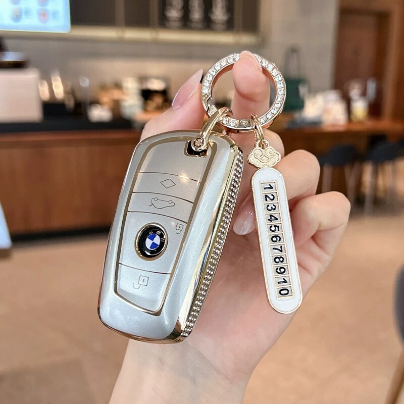 Ключевой чехол Diamond Beaded Border Series B для BMW: Star Meteor Gray с золотой вышитой бабочкой и белым символом мира