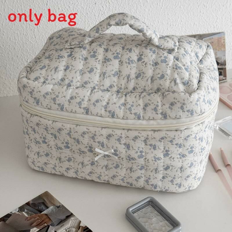 Cosmetic organizer with flower pattern black and white lightweight build white makeup bag