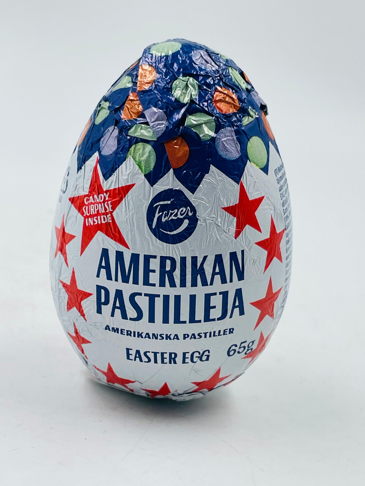 Шоколадное яйцо Fazer Amerikan pastilleja с разноцветными шоколадными пастилками, 65 г (Германия)