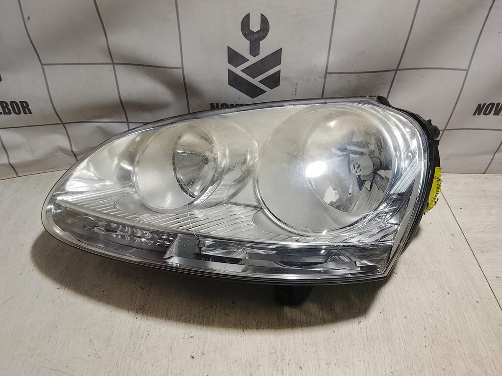 Фара левая VW Golf 5 03-09